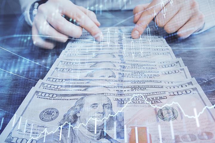 China’s Forex Reserves Swell 2.1% in November as Greenback Slides