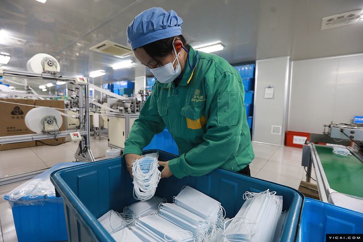 Shanghai Factory Ramps Up Face Mask Production Over Chinese New Year Break
