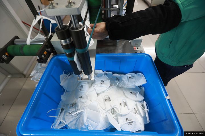 Shanghai Factory Ramps Up Face Mask Production Over Chinese New Year Break