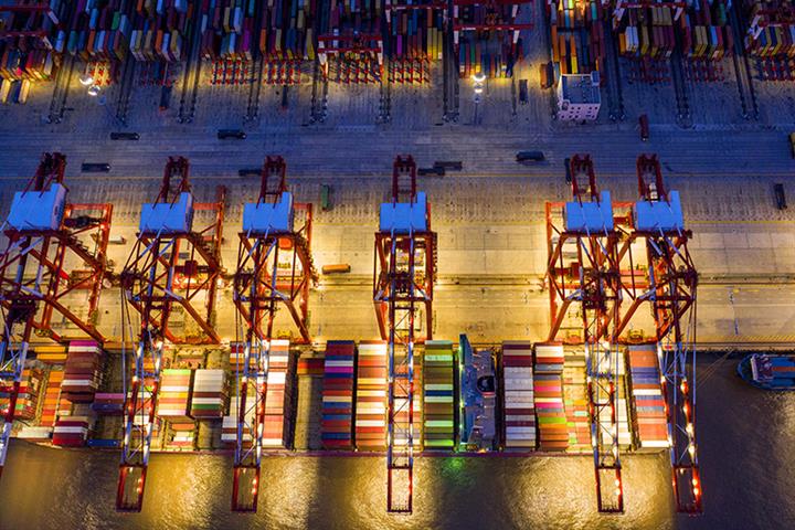 World’s Largest Container Ship Makes Maiden Voyage From Shanghai Shipyard