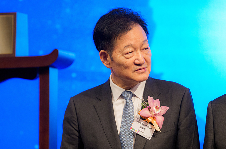 China Pig Farming Giant Muyuan Expands Board as Founder Retires, Son Joins